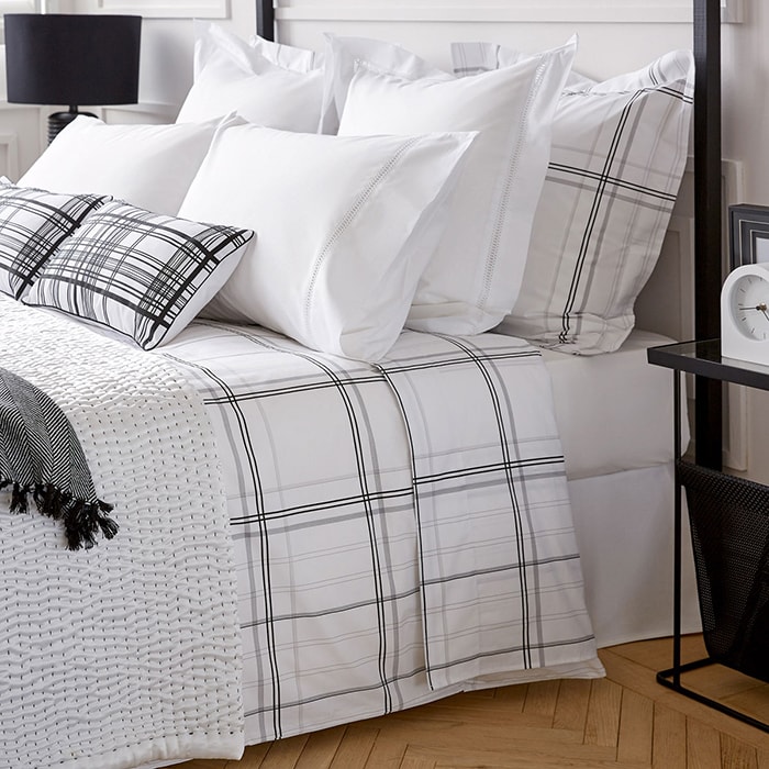 El arte de vestir una cama con estilo • Colchón Exprés